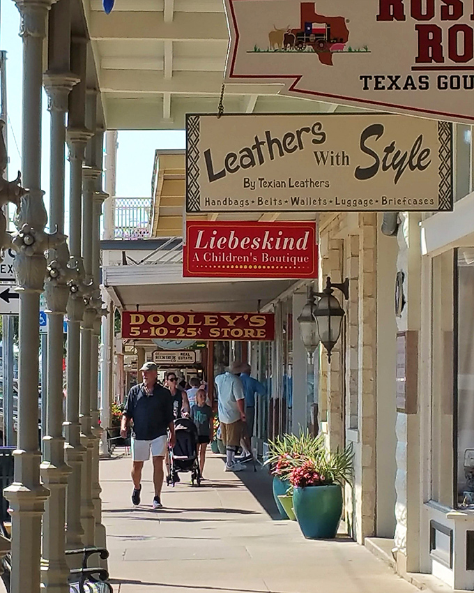 Strolling beneath the covered sidewalks of Fredericksburg feels like stepping back in time, with shops like "Leathers With Style" keeping traditions alive.