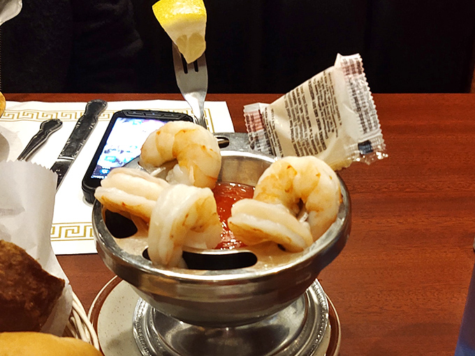 The legendary shrimp cocktail in all its glory&mdash;plump crustaceans perched on the edge of that spicy sauce like divers contemplating the perfect plunge.