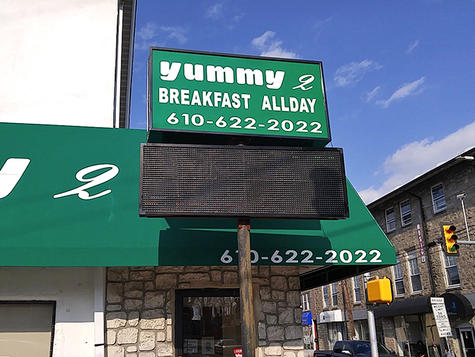 That sign doesn't whisper &ndash; it announces breakfast all day loud enough for the entire neighborhood to hear.