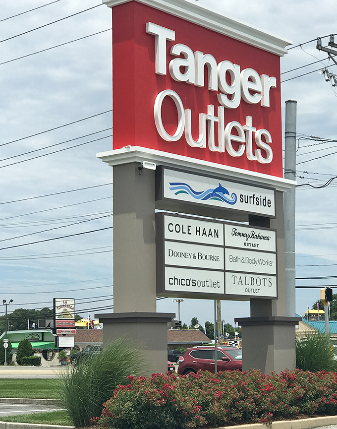 The marquee sign proudly announces premium brands like Cole Haan and Dooney & Bourke, a beacon of hope for fashion-forward bargain hunters.