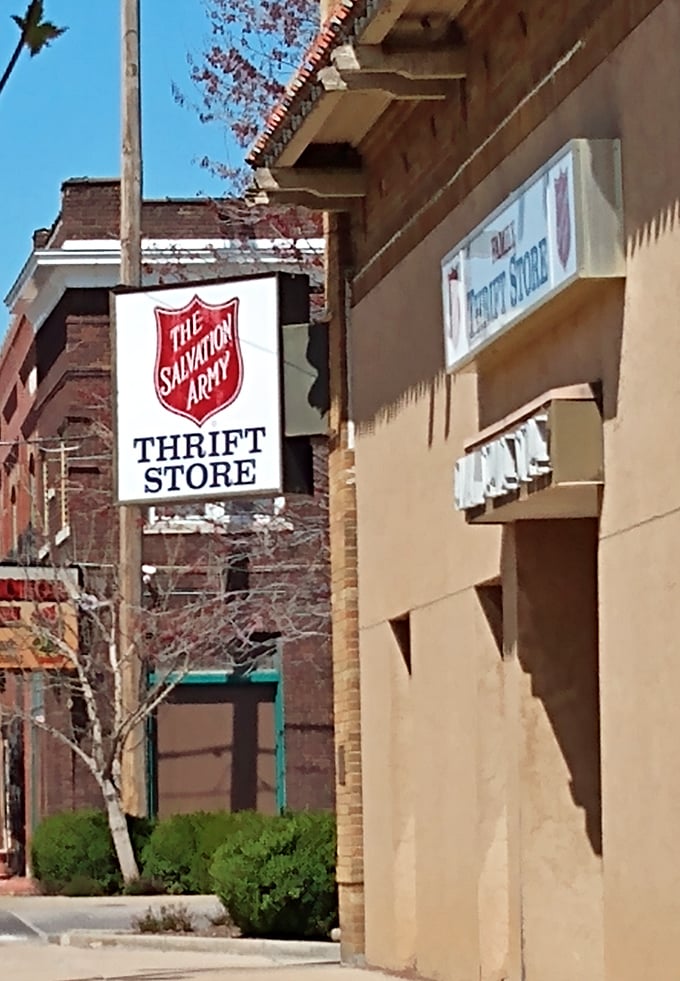 The iconic Salvation Army shield sign stands as a beacon for bargain hunters and a symbol of community support all in one.