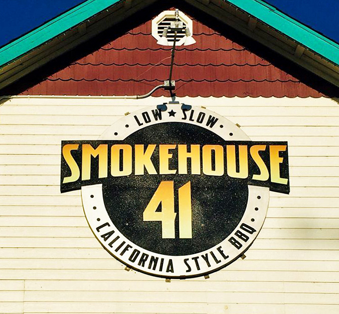 The "LOW & SLOW" motto on their sign isn't just clever branding&mdash;it's the time-honored barbecue philosophy that transforms tough cuts into tender treasures.