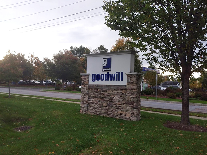 The stone monument sign stands as a landmark for bargain hunters, a North Star for thrifters navigating Burlington's shopping landscape.
