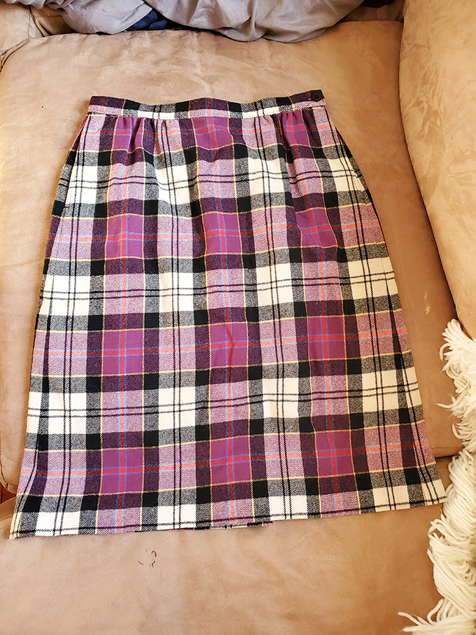 The perfect plaid skirt that makes you wonder if it once twirled at a Scottish festival or starred in a 90s rom-com.