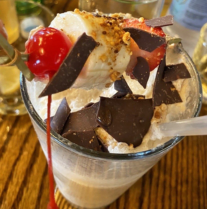 Dessert or drinkable nostalgia? This s'mores creation combines childhood campfire memories with adult indulgence in a glass that's basically joy incarnate.