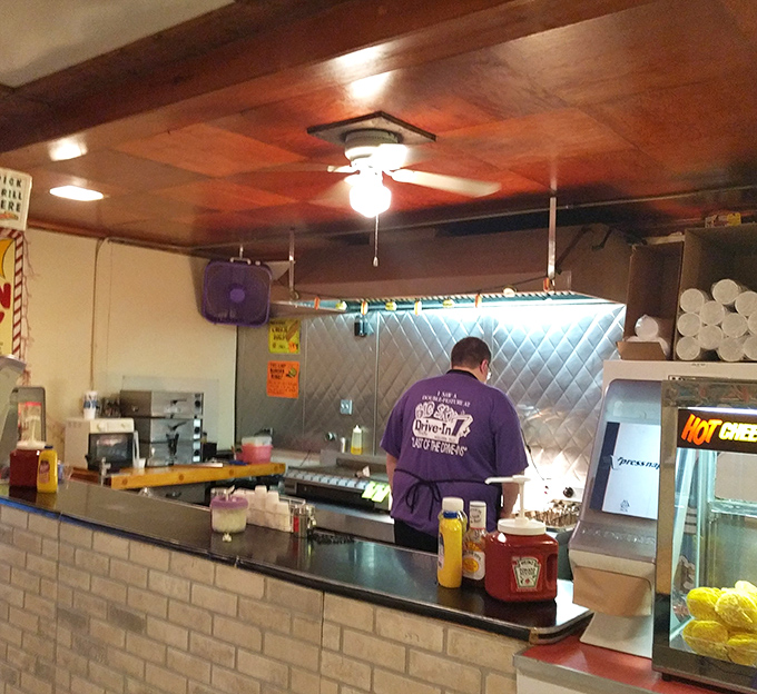 Behind every great drive-in experience is someone in a purple shirt making sure your hot dog is perfectly warmed.
