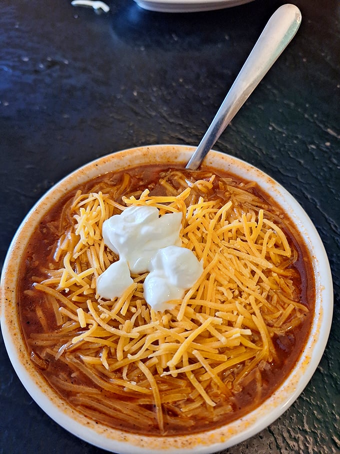 This hearty soup topped with melted cheese and sour cream doesn't care about your summer body goals.