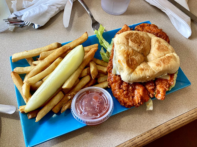 A spicy chicken sandwich that doesn't whisper heat&mdash;it announces it proudly, with crispy fries standing by for cooling relief.