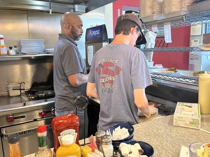 The kitchen crew&mdash;breakfast's unsung heroes&mdash;orchestrating the morning rush with the precision of NASA engineers but with more bacon.