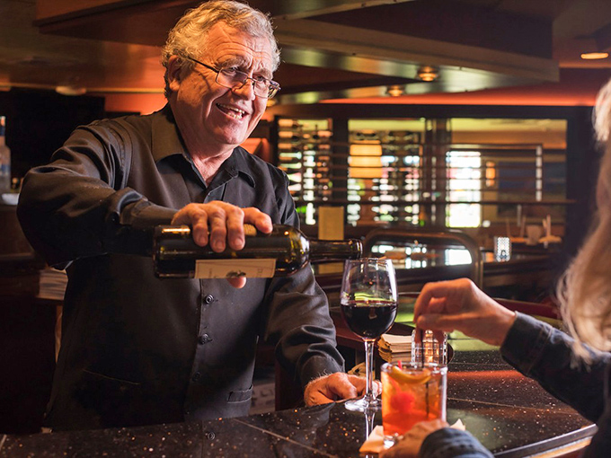 Wine service with a smile&mdash;where every pour comes with decades of expertise and zero pretension.