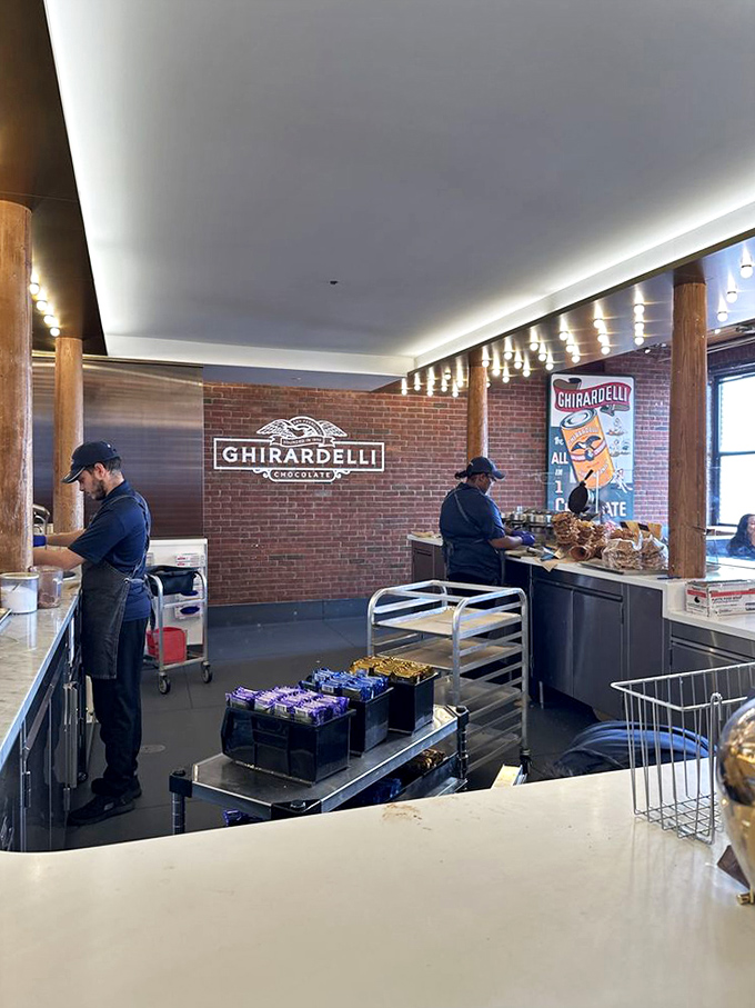 The chocolate artisans at work, performing the sacred ritual of transforming cacao into moments of pure bliss.