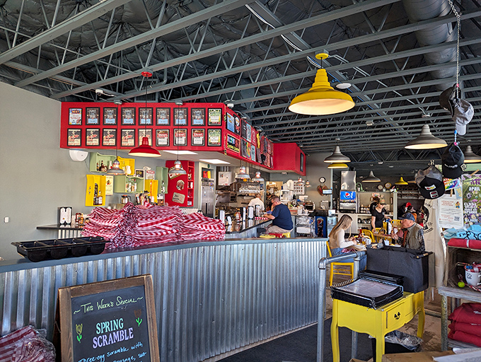 Behind the counter magic happens daily, where industrial meets homey in a space that feels like breakfast headquarters.