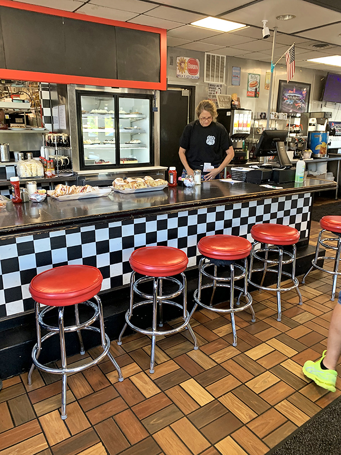 Behind the counter, where efficiency meets hospitality &ndash; the diner's engine room where coffee flows as freely as conversation.