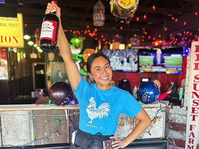 This cheerful server's smile suggests she knows exactly how happy you're about to be with your order.