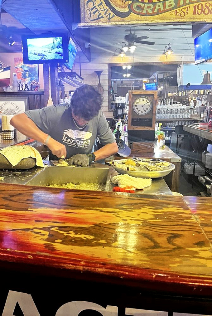 Where the magic happens! Watching skilled hands prepare seafood is like seeing a sculptor at work&mdash;if sculptures were deliciously edible.