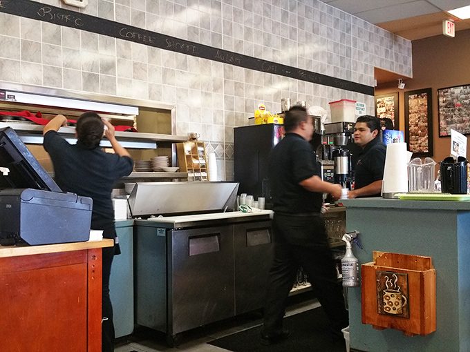 The kitchen crew moves with the choreographed precision of dancers who've performed together for years. This is where the magic happens.