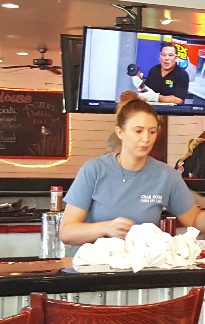 The staff moves with the practiced efficiency of people who know their seafood is worth every second of the wait.