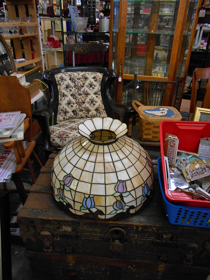 Tiffany-style lampshade that transforms ordinary light into stained-glass magic. Your grandmother would approve of this floral-patterned beauty.