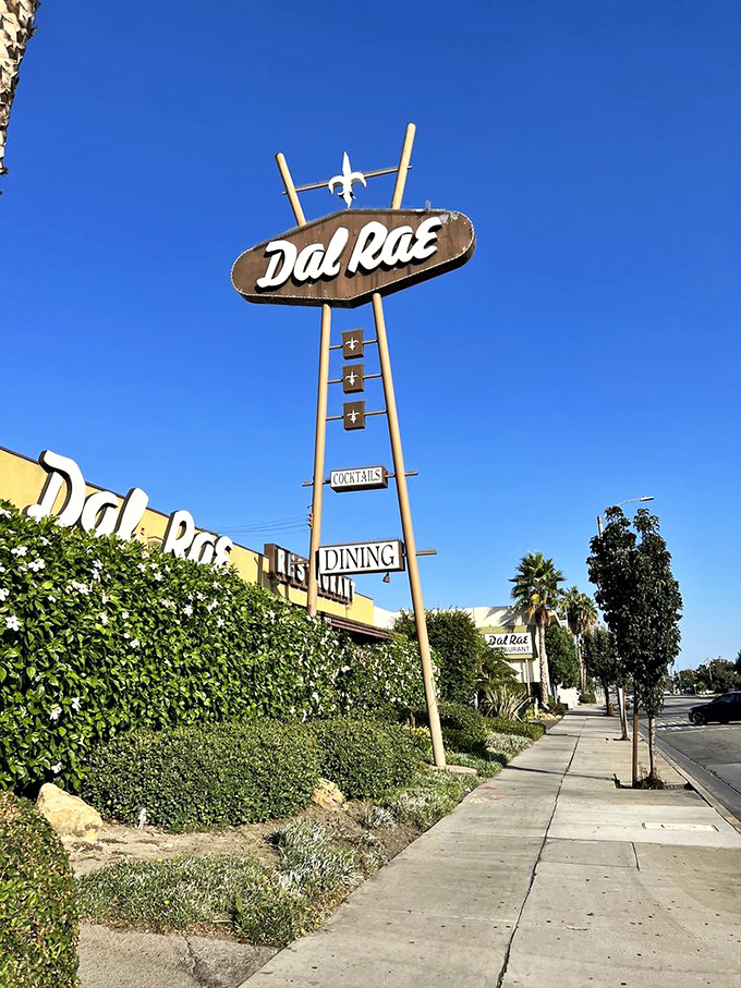 That retro sign isn't just advertising—it's a time machine. One glance and you're transported to an era when dinner was an event, not just a meal.