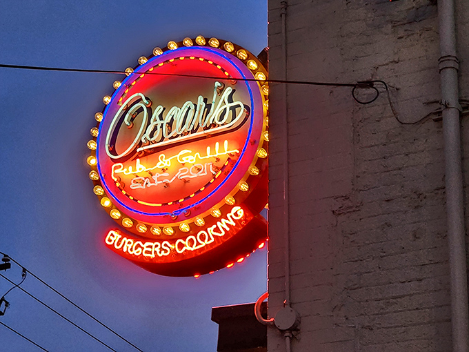 The neon sign glows like a burger beacon in the night, guiding hungry souls to their delicious destiny.