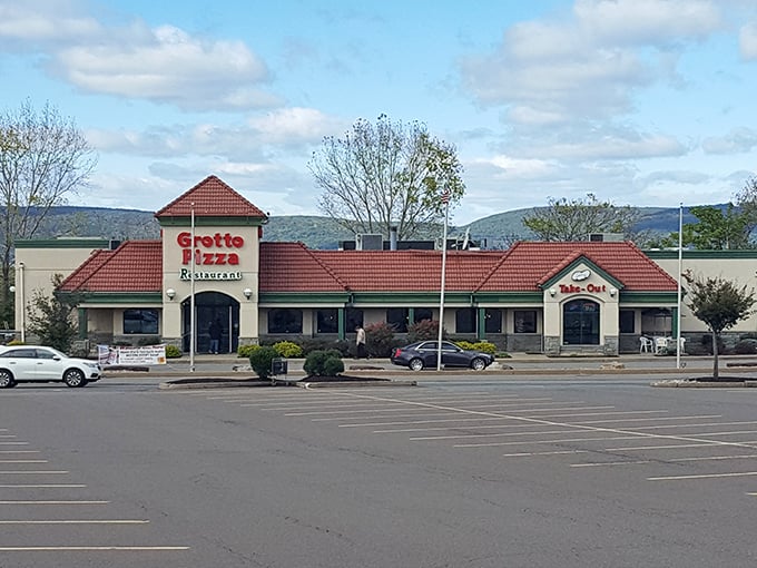A Grotto Pizza outpost standing proud against the Pennsylvania sky. Those mountains in the background are jealous they're not made of cheese and dough.