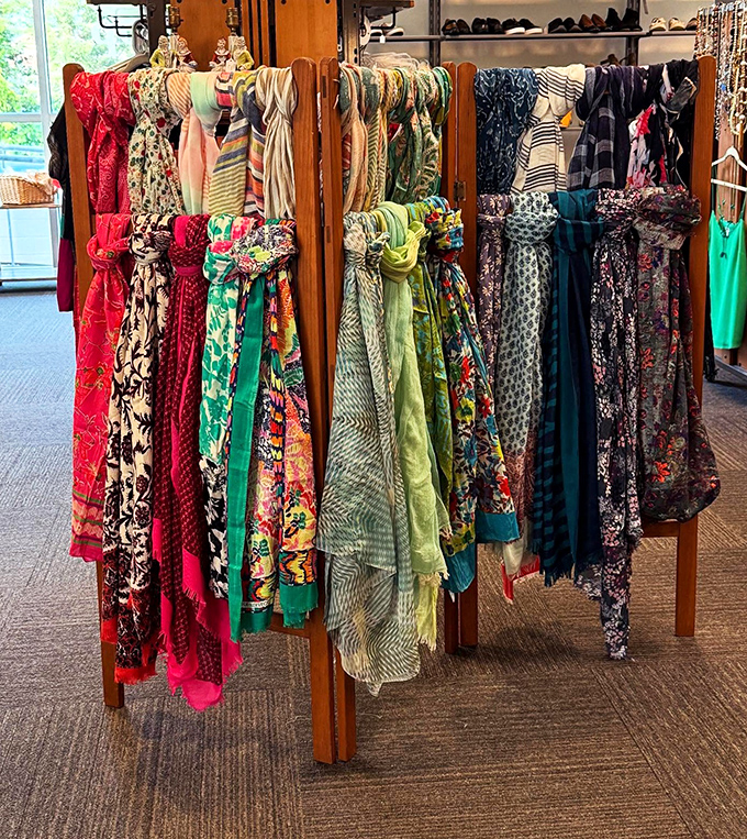 The scarf collection: a rainbow of possibilities where one person's "doesn't match anything I own" becomes your signature accessory.