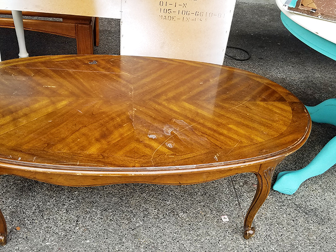 This mid-century coffee table has seen some living rooms! With a little TLC, it's ready to hold your remote collection for decades more.