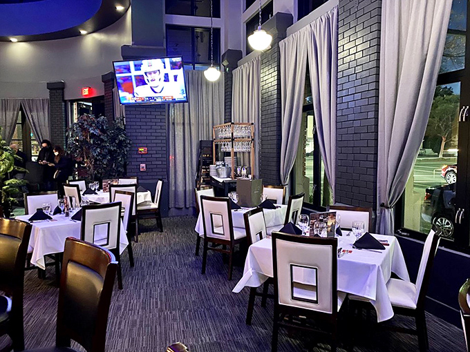 White tablecloths and square-backed chairs create an elegant backdrop for the real stars of the show&mdash;the parade of meats heading your way.