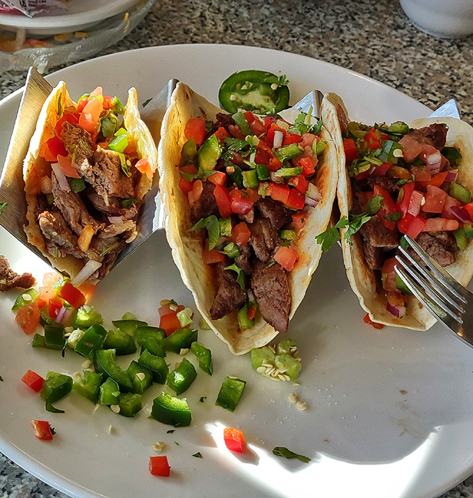 These tacos aren't trying to be authentic; they're trying to be delicious. Mission accomplished with fresh toppings and tender meat.