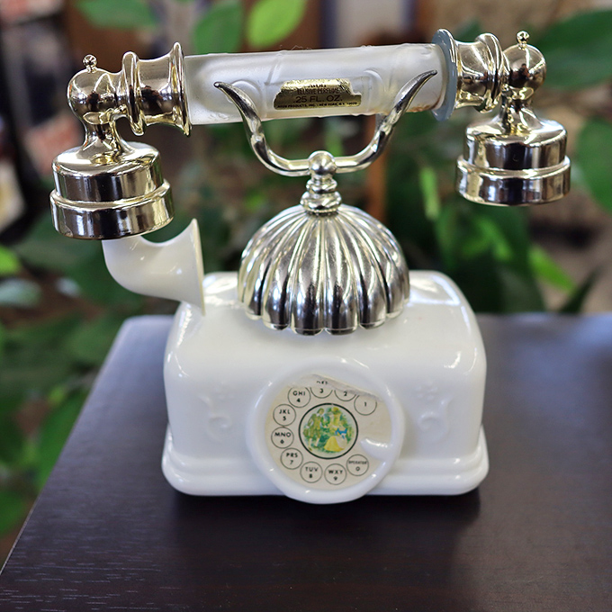Hello, gorgeous! This vintage telephone doesn't connect to Wi-Fi, but it connects generations through its charming rotary nostalgia.