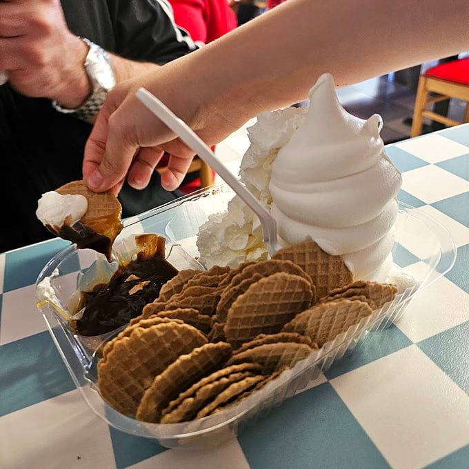 The waffle bowl sundae ritual: scoop the ice cream, scrape the chocolate, break off pieces of waffle. Repeat until blissfully satisfied.