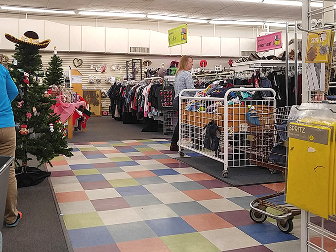 The multicolored floor tiles create a cheerful backdrop for serious treasure hunters pushing carts filled with future wardrobe and decor transformations.