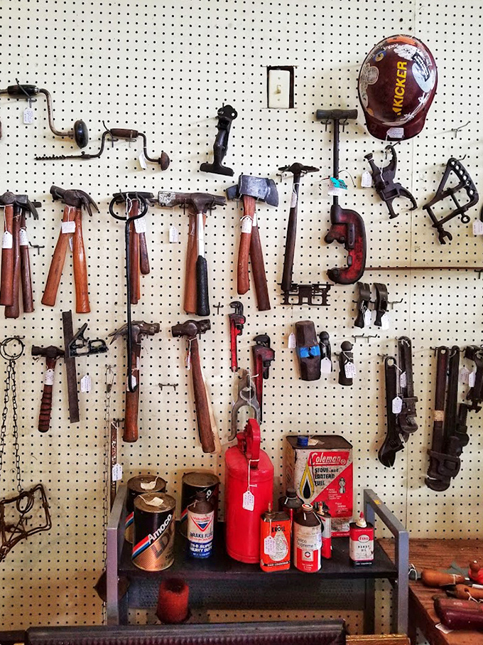 Vintage hammers, drills, and oil cans transform this wall into a tribute to American craftsmanship&mdash;each tool telling stories of work completed.