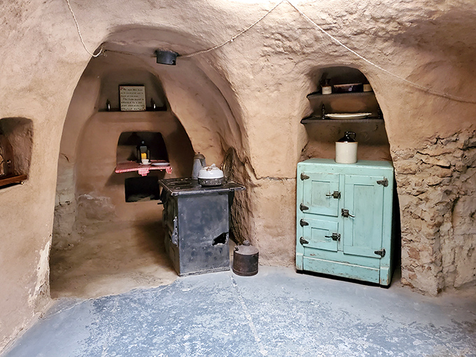 Arched storage alcoves and curved ceilings demonstrate how functional spaces became artistic expressions when carved with care and vision.