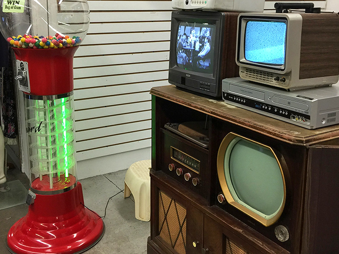 Television history on display! From wood-paneled consoles to portable sets, these vintage screens witnessed decades of American living rooms. 