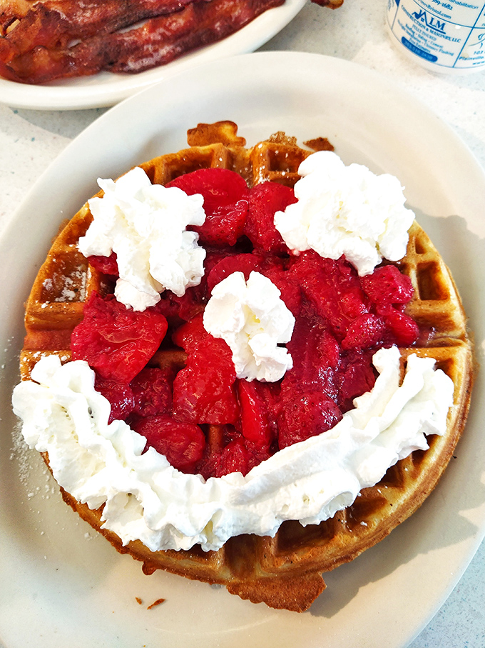 A waffle that's dressed for success with strawberries and whipped cream&mdash;breakfast that thinks it's dessert, and we're not complaining.