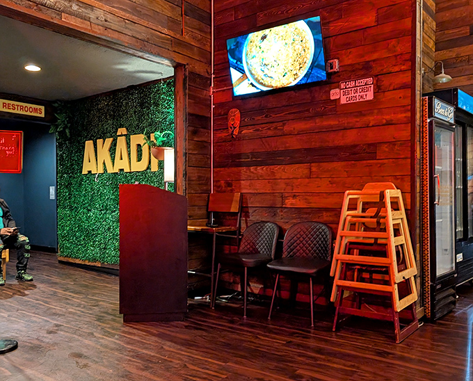 The moss wall AKADI sign welcomes you like an old friend who happens to be incredibly stylish and knows where to find amazing food.