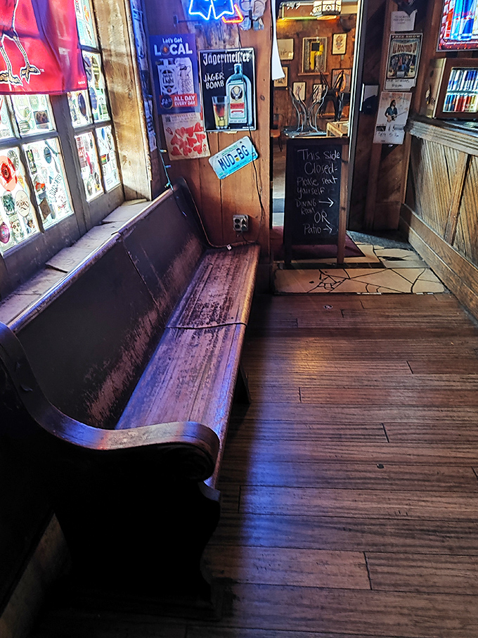 The waiting area's worn wooden bench has heard more stories, supported more first dates, and witnessed more celebrations than most therapists.
