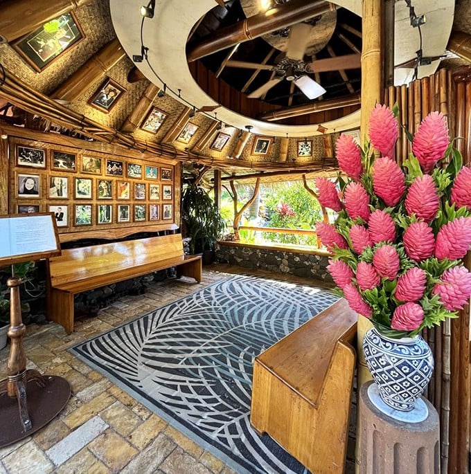 The waiting area that makes waiting a pleasure. Those pink ginger flowers aren't just decoration &ndash; they're nature's way of saying "the food is worth it."