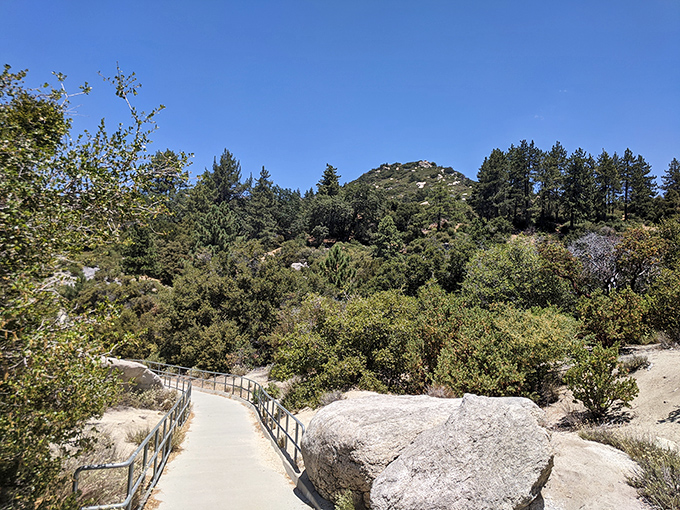 The path beckons with promises of discovery&mdash;a gentle ribbon of concrete guiding visitors through chaparral to vistas worth every step.