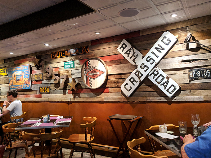 The rustic wall decor featuring road signs and Americana creates an atmosphere that says, "Relax, we've been doing this a while and know what we're doing."