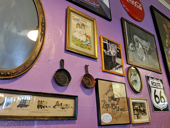 Purple walls showcase the restaurant's soul&mdash;cast iron pans and vintage photos tell stories that make the food taste even better.