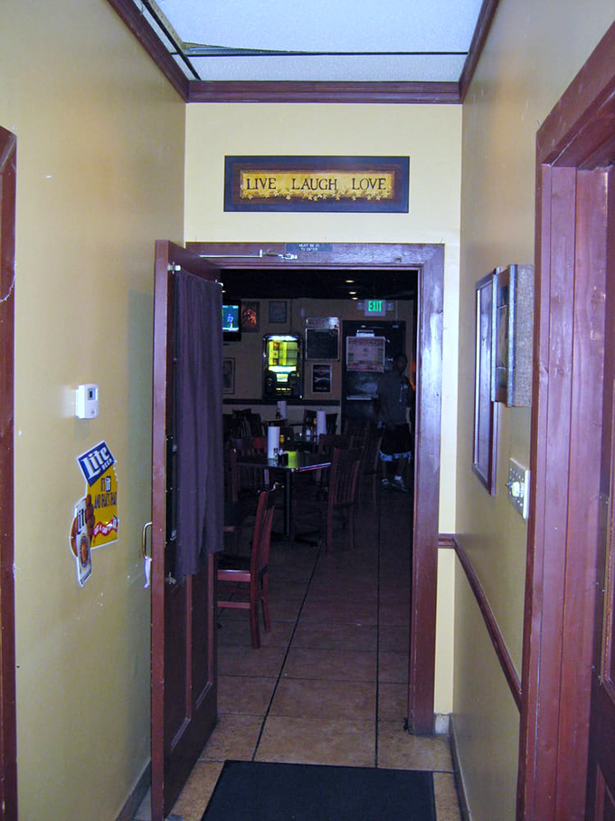 Live, Laugh, Love sign above the entrance&mdash;because that's exactly what happens when you gather friends around plates of exceptional barbecue.