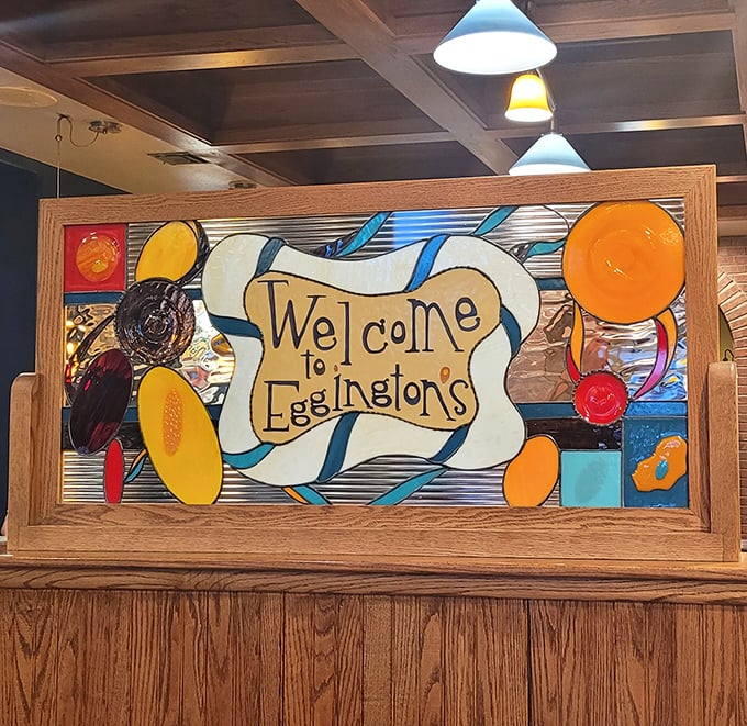 This stained glass welcome sign isn't just decoration&mdash;it's your first hint that breakfast here is treated as an art form.