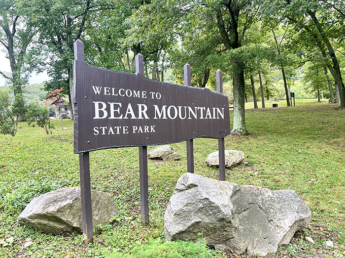 The welcome sign that promises adventure. Like the doorway to Narnia, but with better hiking trails and fewer talking lions.