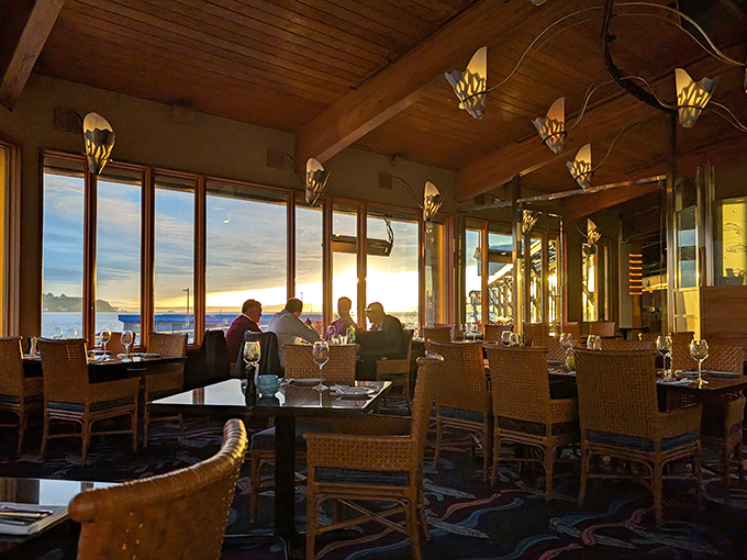 Sunset through these windows turns dinner into dinner theater, nature's way of stealing the show completely.