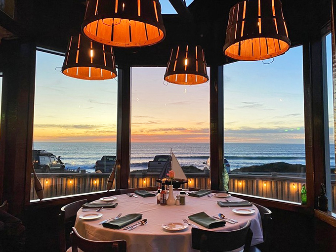 As daylight fades, the restaurant's panoramic windows frame a Pacific sunset that rivals the food for star billing.