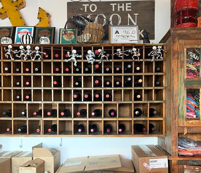 A wine rack guarded by skeletal sentinels&mdash;because good seafood deserves good wine, and good wine deserves good protection.