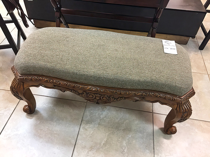 This ornate wooden bench has seen some stories. Now it's waiting for its next chapter in your entryway or at the foot of your bed.