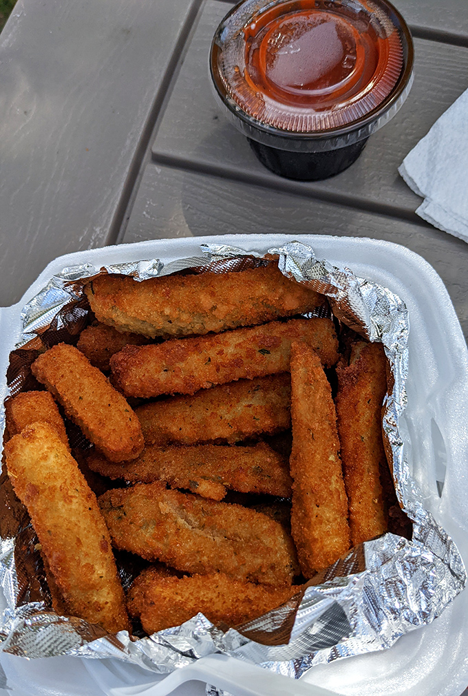 These aren't just any zucchini sticks&mdash;they're golden-armored vegetable soldiers ready to dive into marinara's welcoming embrace.